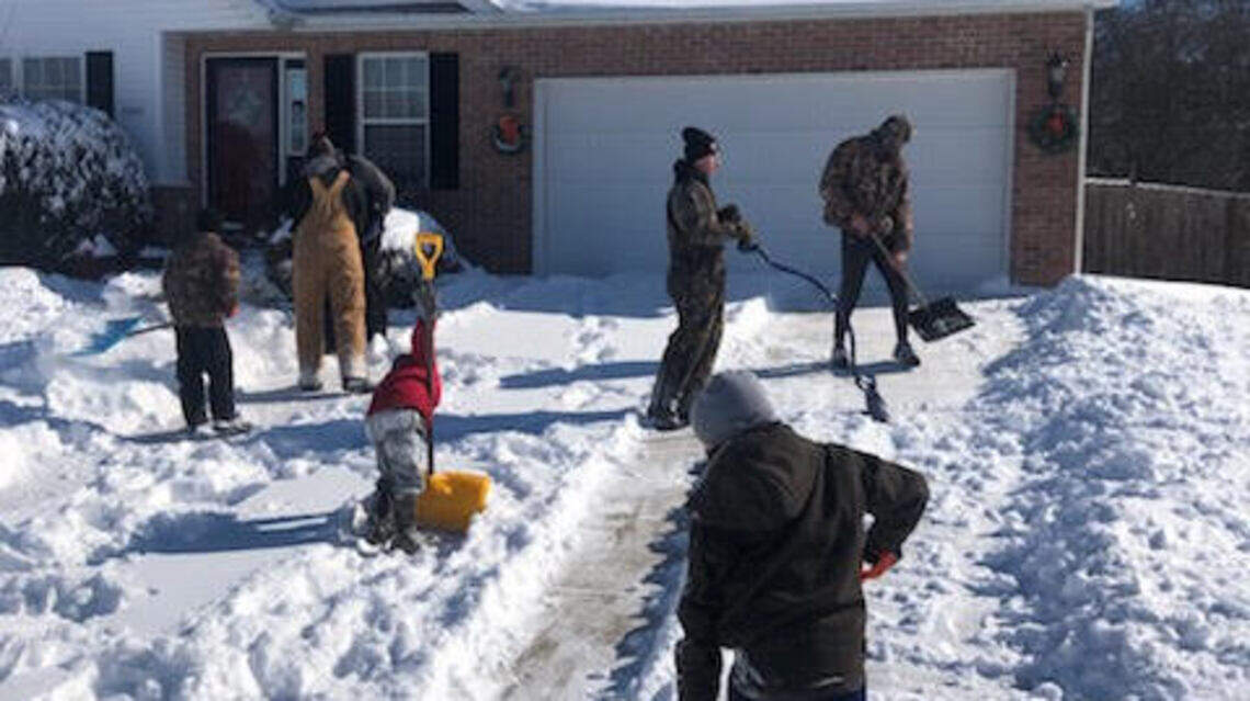 Highland IL football players help community during snowstorm ...